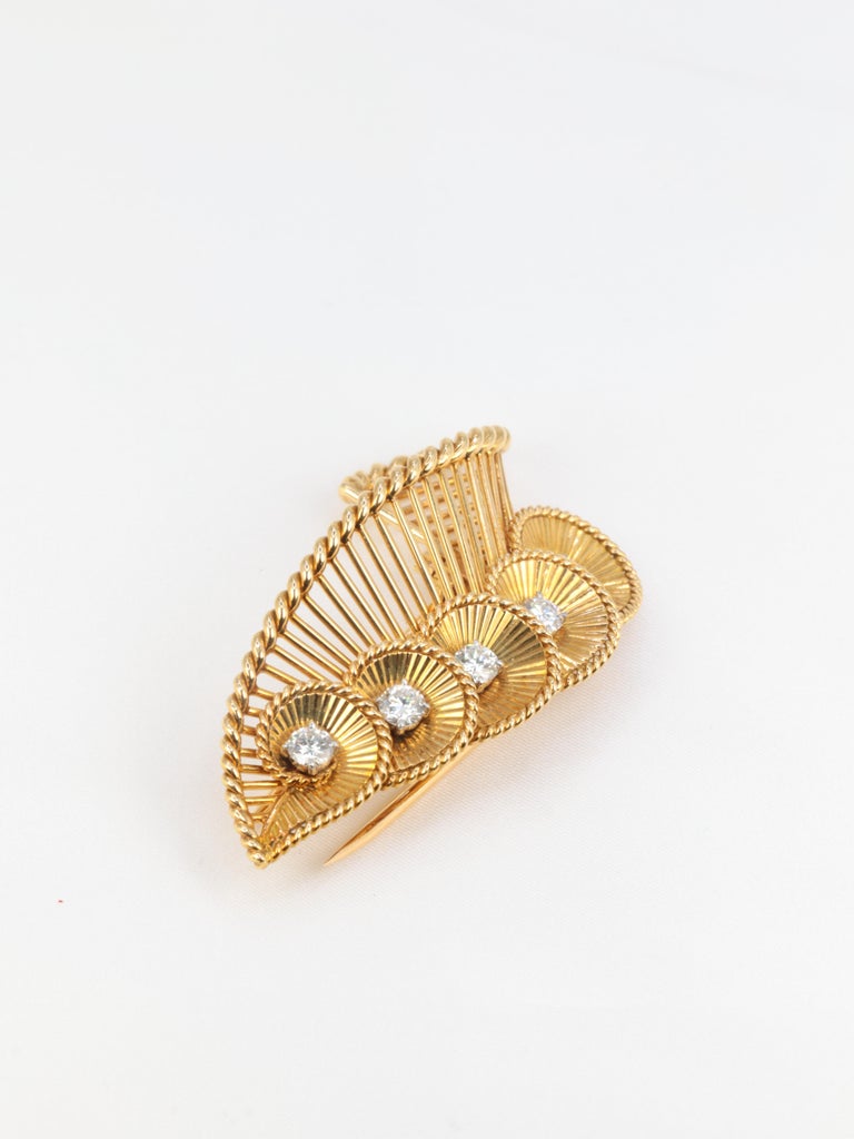 Gold Vintage Cartier Shell Brooch with Diamonds For Sale at 1stDibs