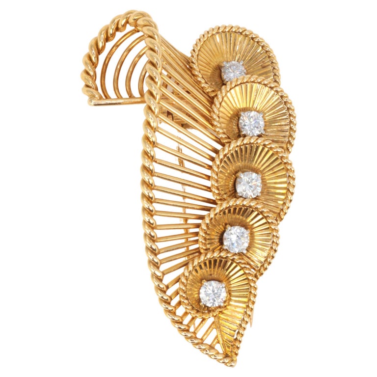 Gold Vintage Cartier Shell Brooch with Diamonds For Sale at 1stDibs