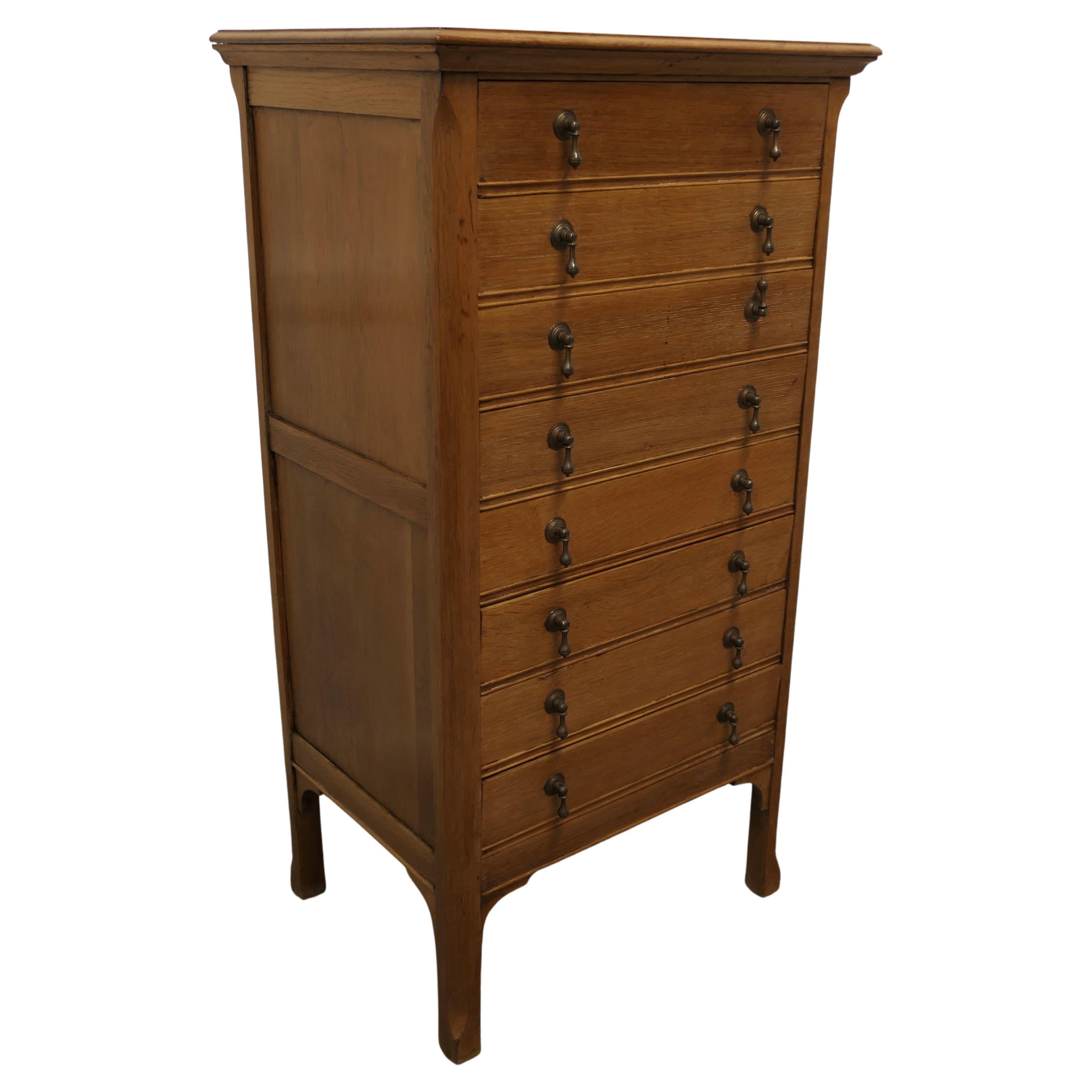 Golden Oak Arts and Crafts 8 Slide Music Cabinet at 1stDibs