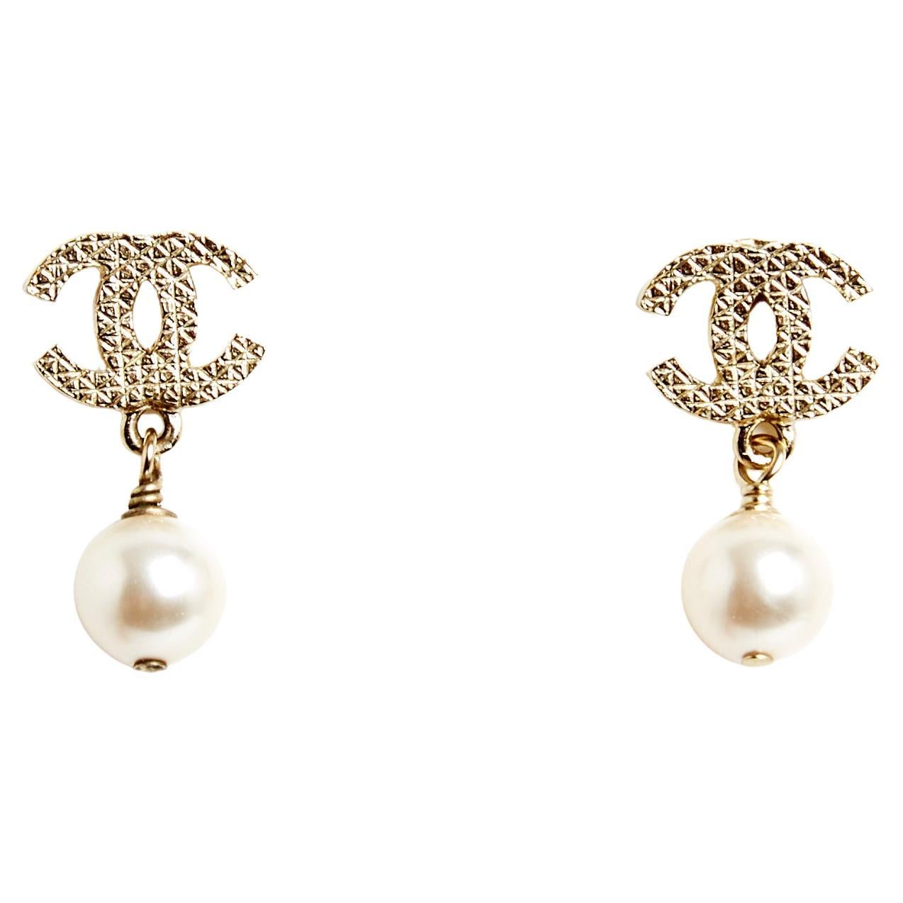 Golden Quilted CC and fancy pearl For Sale at 1stDibs