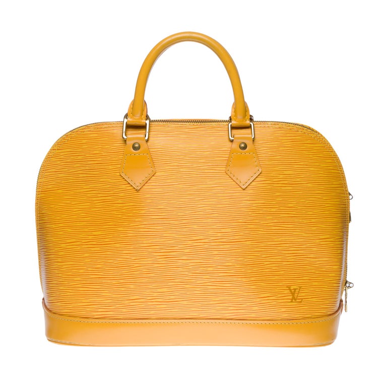 Gorgeous Louis Vuitton Alma handbag in Yellow epi leather, GHW at 1stDibs