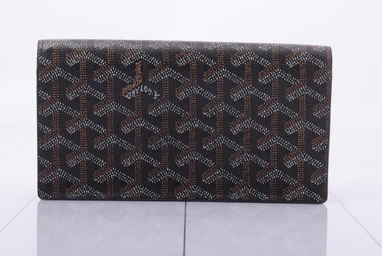 Goyard Richelieu long wallet is crafted of classic Goyardine Chevron ...