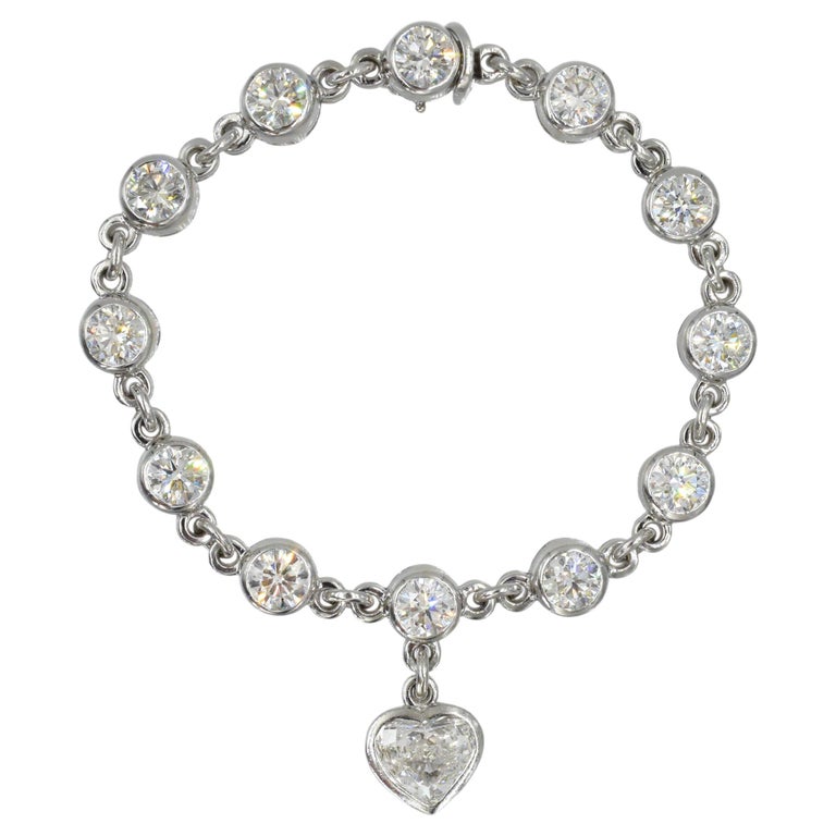 Graff Diamond Charm Bracelet in Platinum at 1stDibs