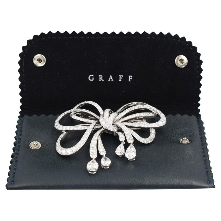 Graff Platinum and Diamond Bow Clip Brooch For Sale at 1stDibs