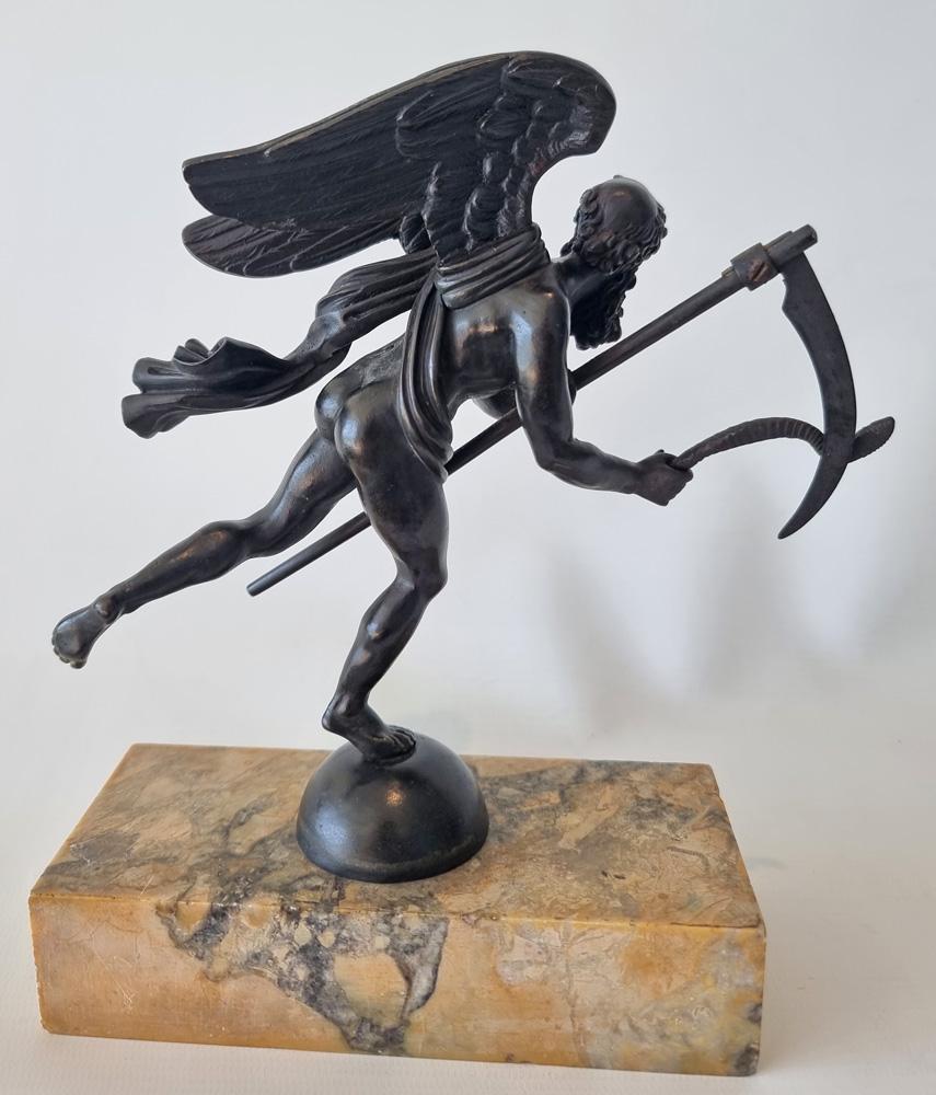 Grand Tour patinated bronze figure of Chronos set on a sienna marble ...
