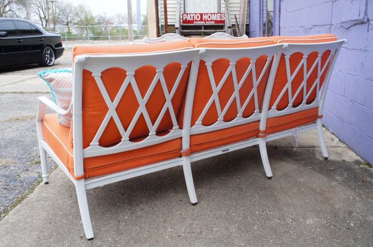 Grayson French Inspired Aluminum Sofa with Orange Cushions and Lattice ...