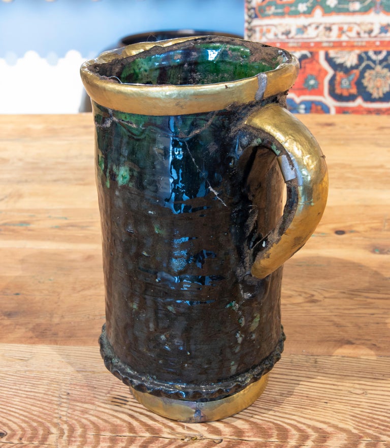 Green Glazed Ceramic Jug with Metal Strengthening For Sale at 1stDibs