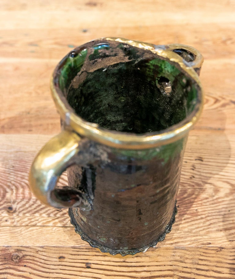 Green Glazed Ceramic Jug with Metal Strengthening For Sale at 1stDibs
