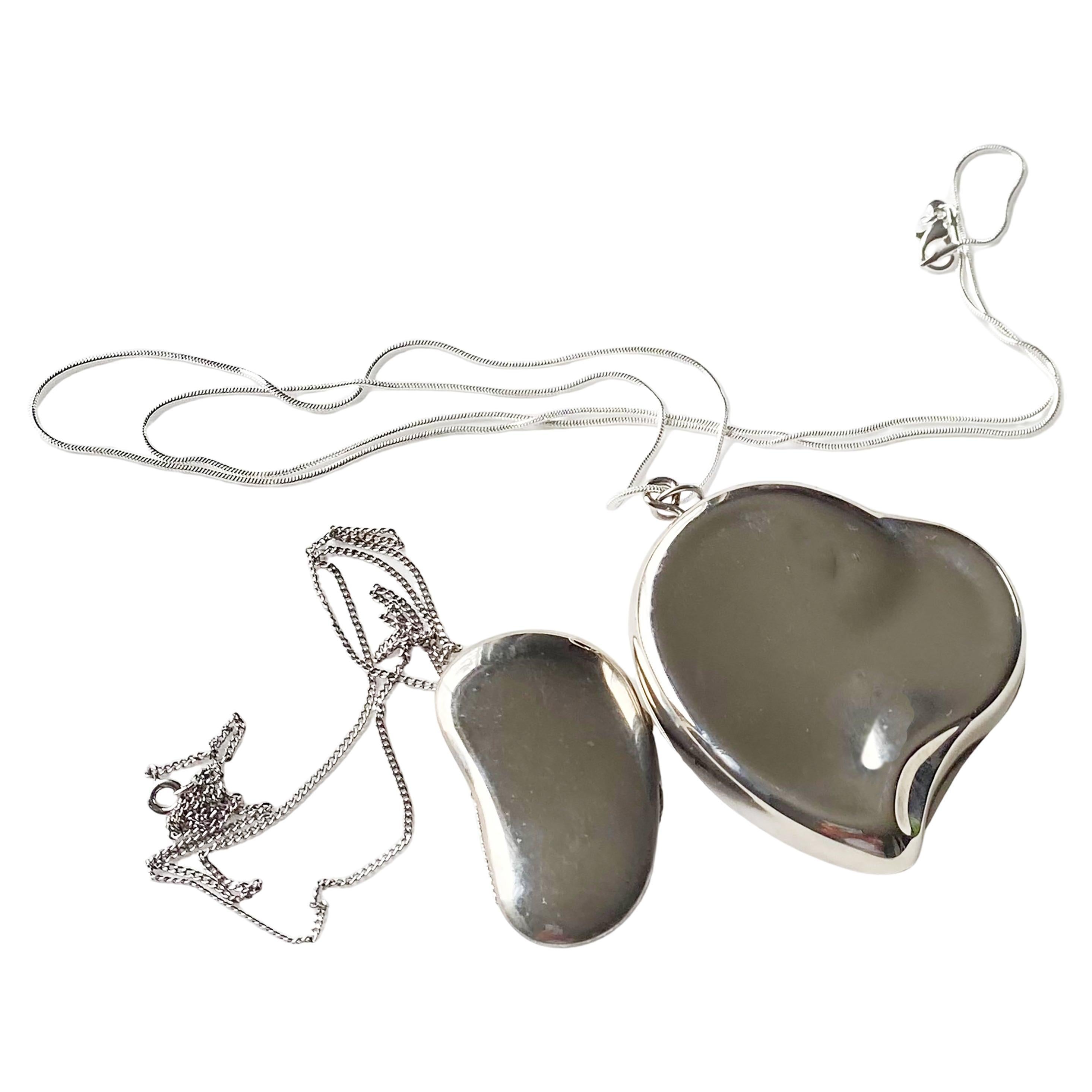 Pair of Elsa Peretti for Halston Solid Perfume Pendant Necklaces For ...
