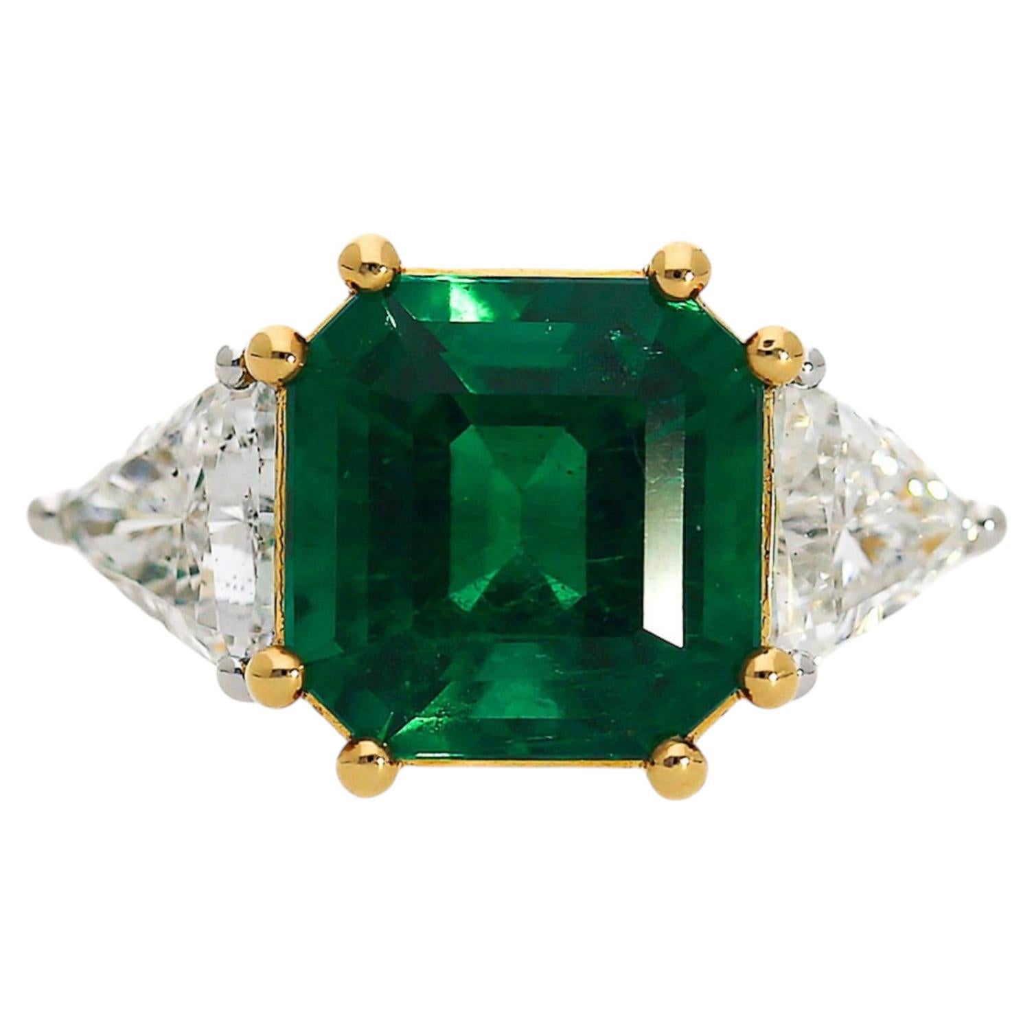 20.78 cts Certified Vivid Green Octagon Emerald Three-stone Diamond ...