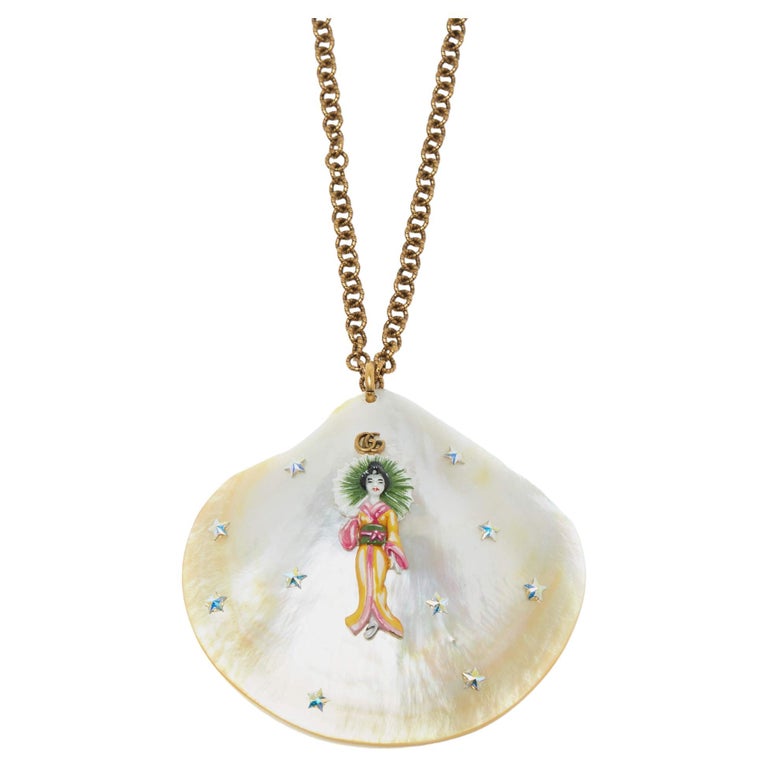 Gucci Aged Gold Tone Mother of Pearl Shell Geisha Pendant Necklace For ...