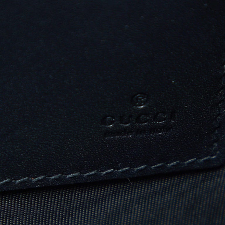 Gucci Black/Gold Leather 'Guccy' Zip Wristlet Clutch For Sale at 1stDibs