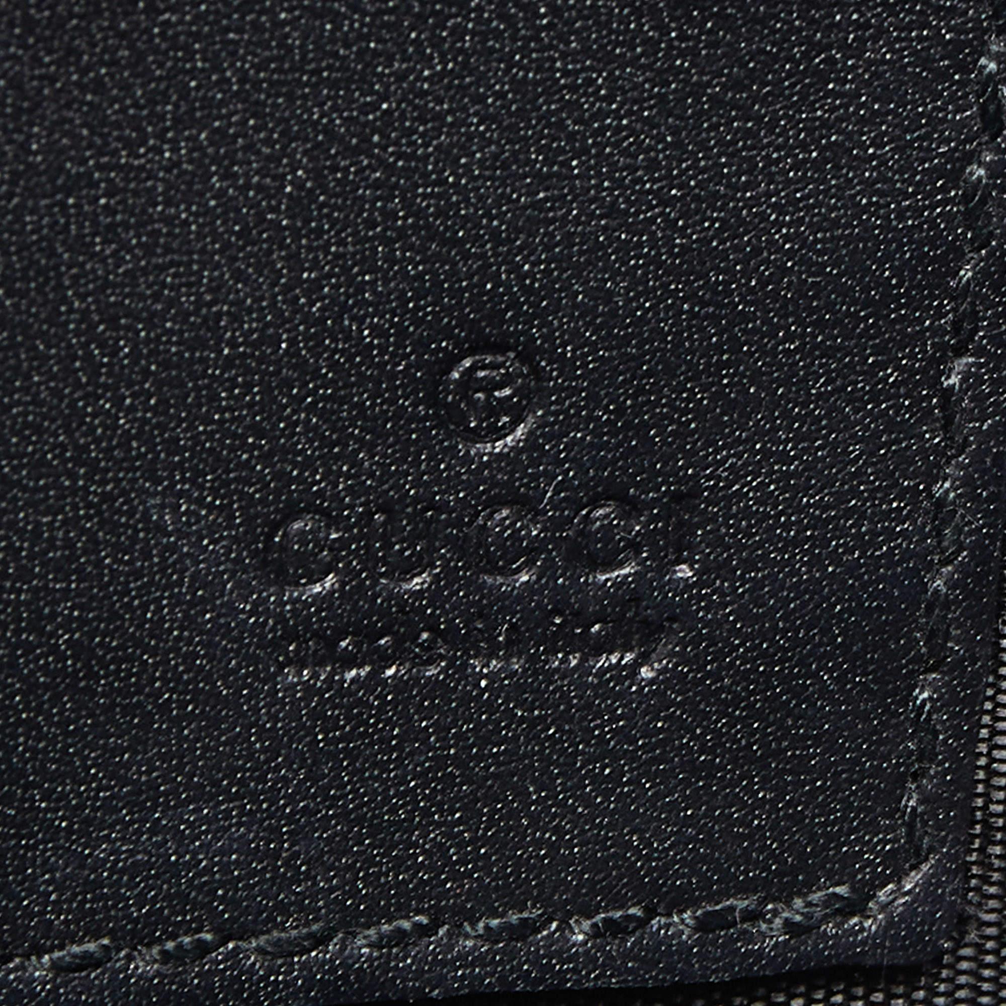 Gucci Black/Gold Leather 'Guccy' Zip Wristlet Clutch For Sale at 1stDibs