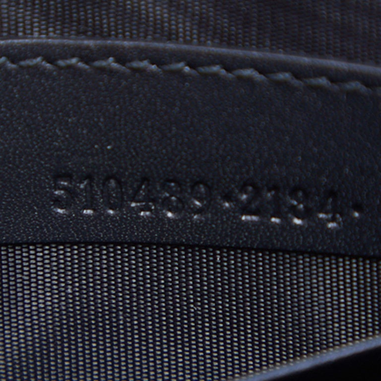 Gucci Black/Gold Leather 'Guccy' Zip Wristlet Clutch For Sale at 1stDibs