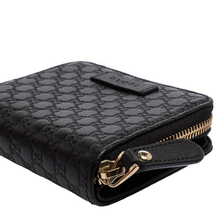 Gucci Black Microguccissima Leather Compact Wallet at 1stDibs