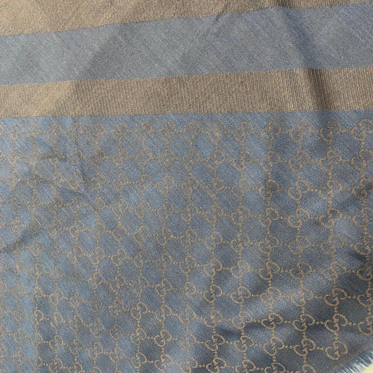 A Gucci Blue Scarf in Wool and Silk with Gucci motif Continuous Logo ...