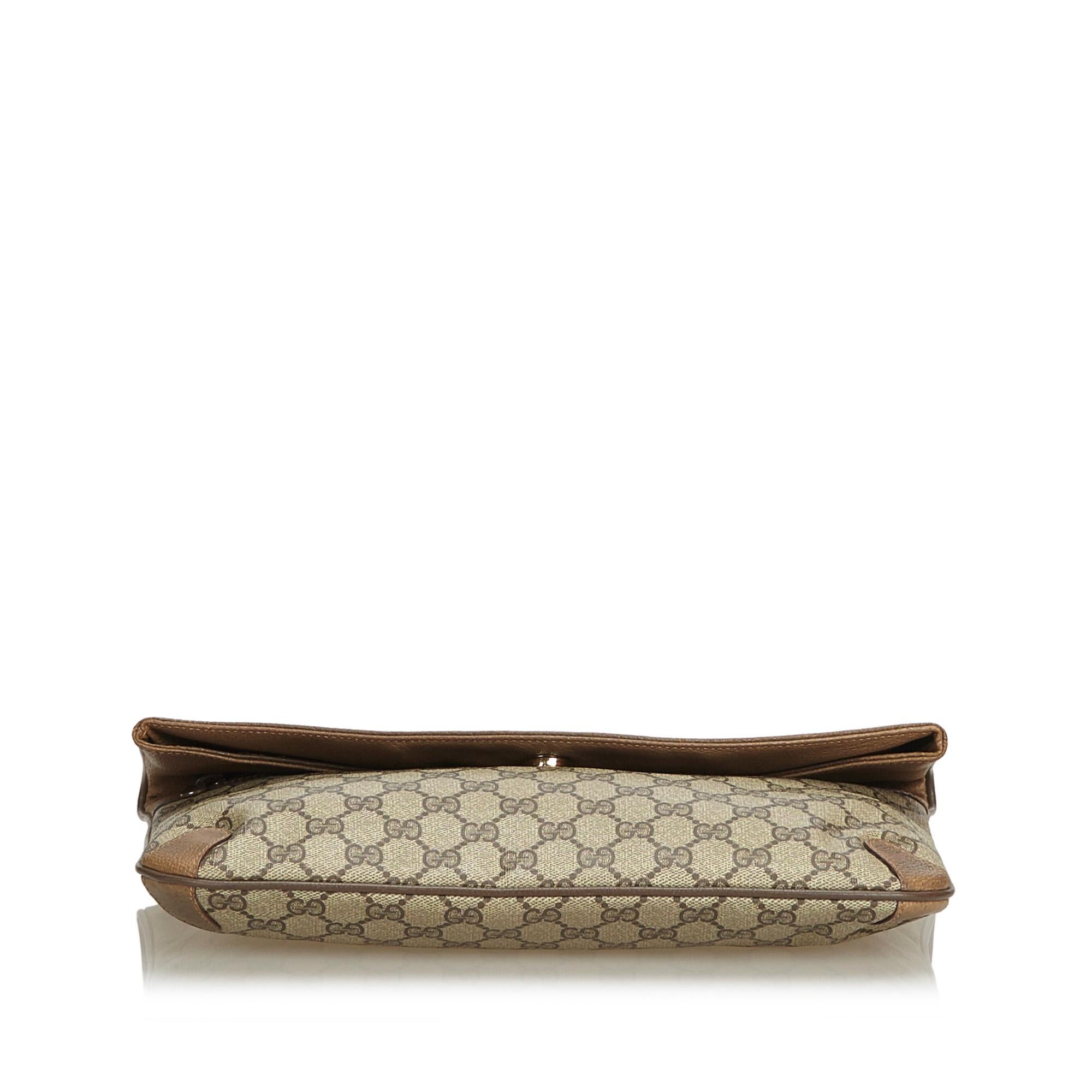 Gucci Brown Beige PVC Plastic GG Clutch Bag Italy For Sale at 1stDibs