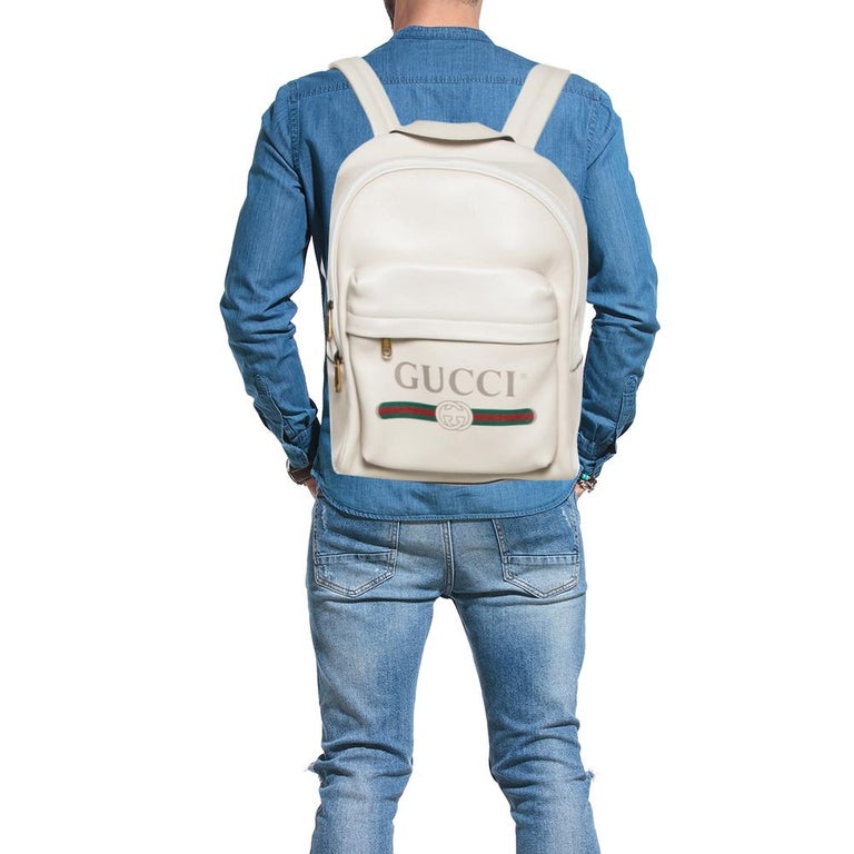 Gucci Cream White Leather Gucci Print Backpack at 1stDibs