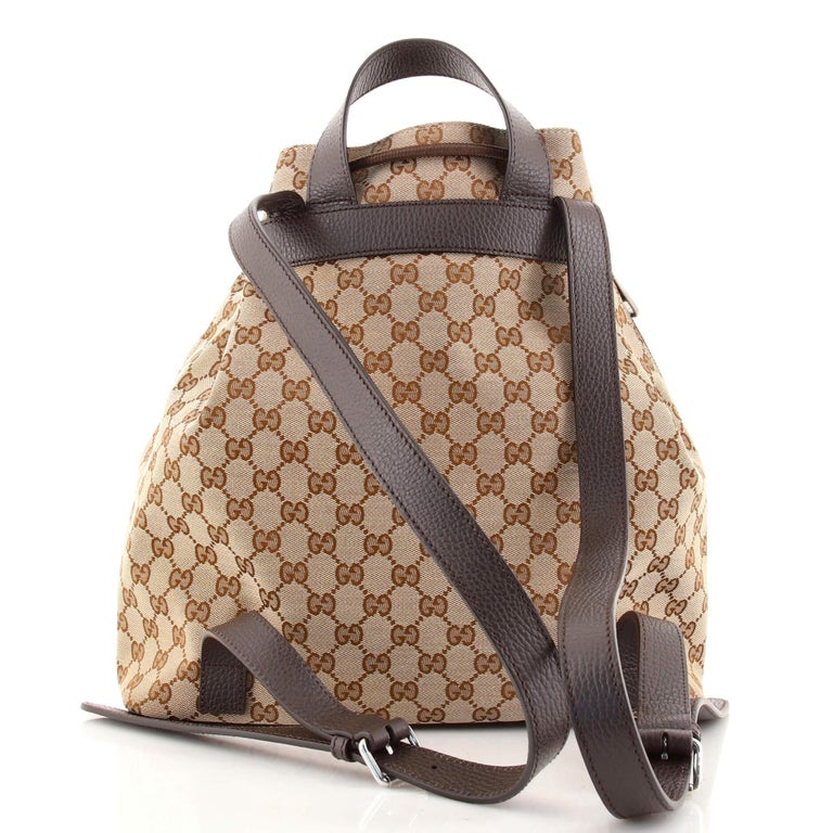 Gucci Drawstring Backpack (Outlet) GG Canvas Medium For Sale at 1stDibs