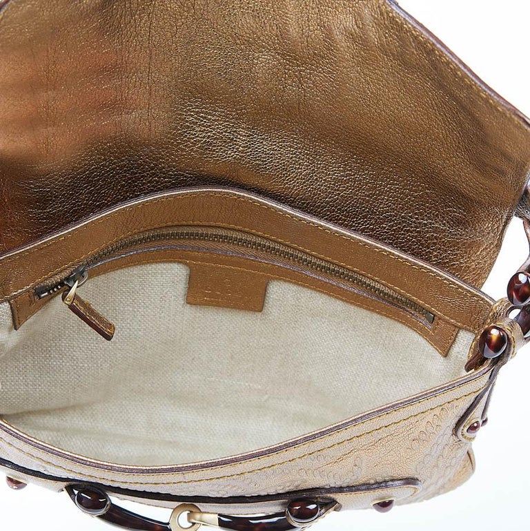 GUCCI Embossed Gold Leather Vintage Handbag For Sale at 1stDibs