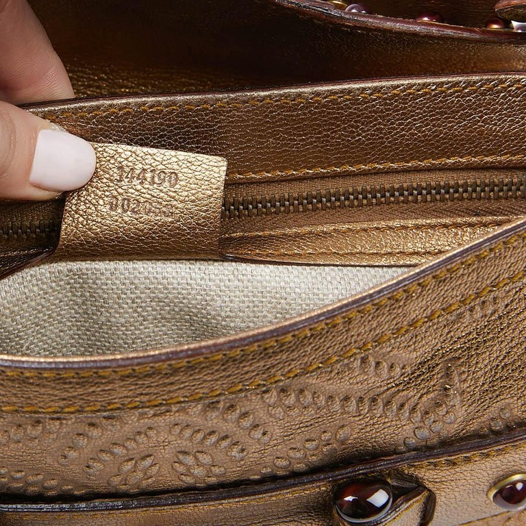GUCCI Embossed Gold Leather Vintage Handbag For Sale at 1stDibs
