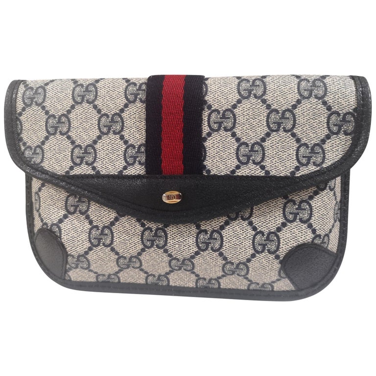Gucci GG blu passport case at 1stDibs
