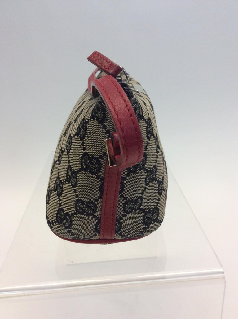 Gucci Monogram Mini Handbag with Red Strap For Sale at 1stDibs