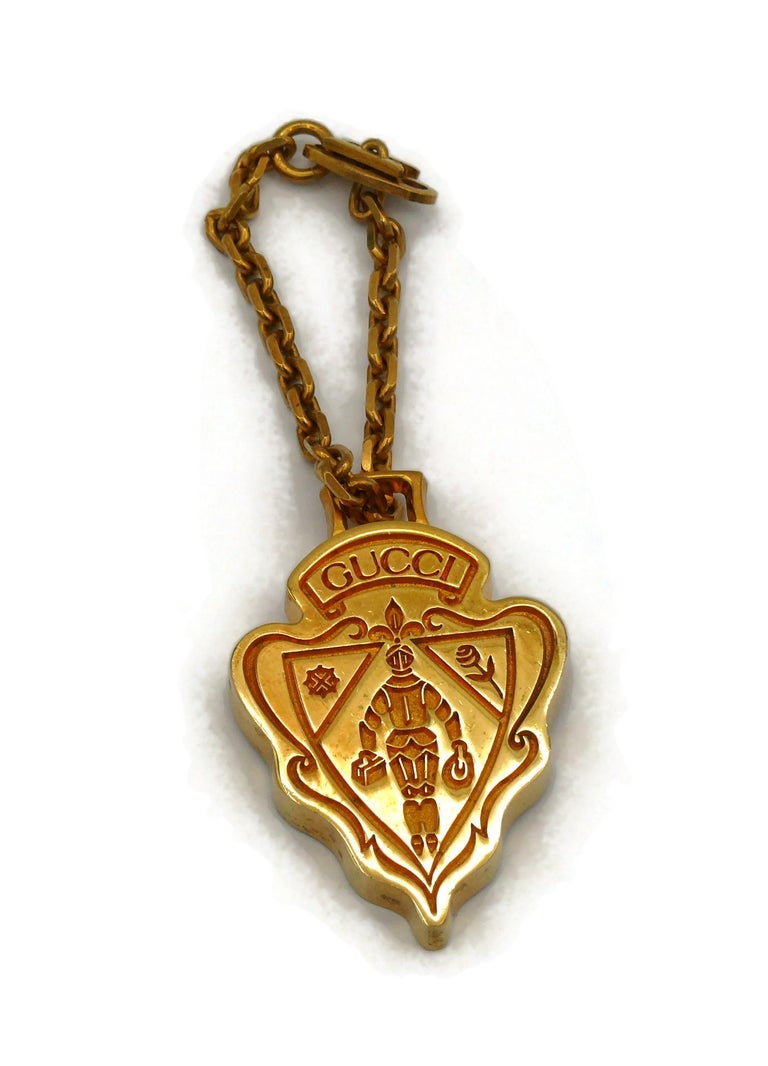 GUCCI Parfums Vintage Gold Tone Crest Accessory For Sale at 1stDibs