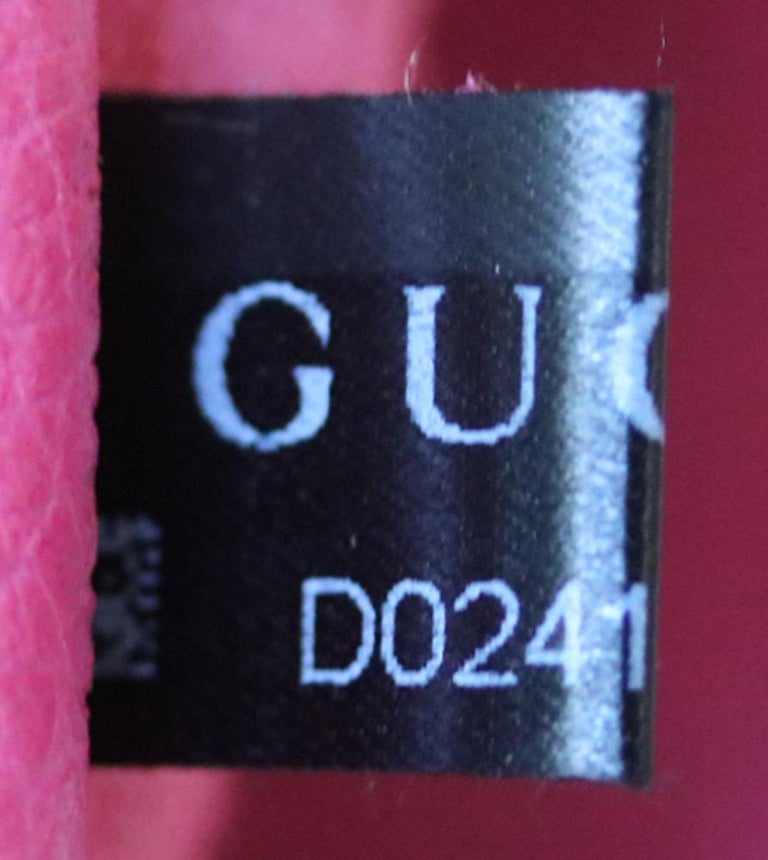 Gucci Printed Textured Leather Pouch at 1stDibs