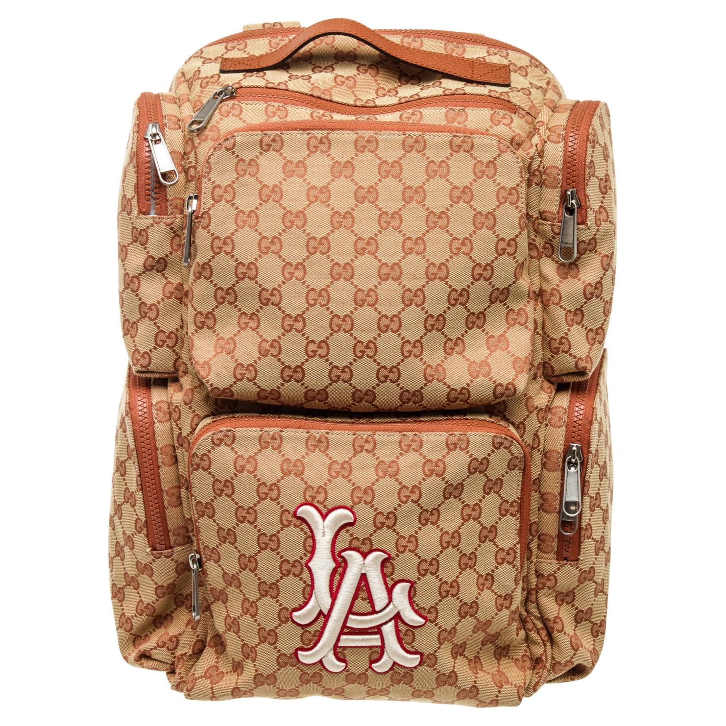 Gucci Red Leather Print Logo Drawstring Large Backpack For Sale at 1stDibs