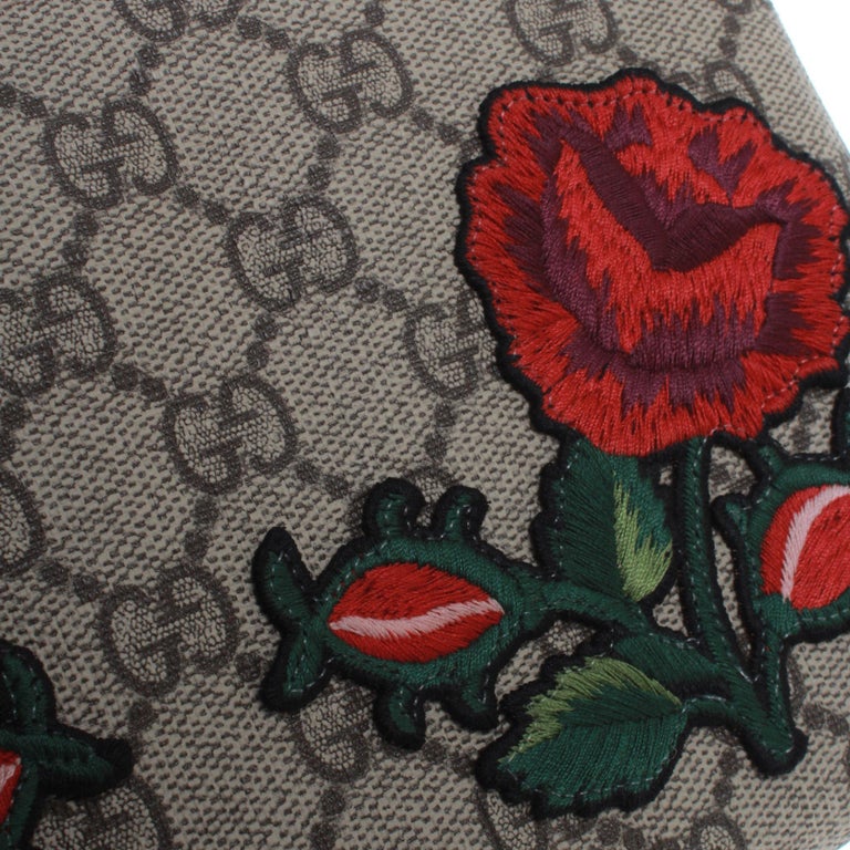 Gucci Rose Clutch Bag with GG monogram print and gold chain strap at ...