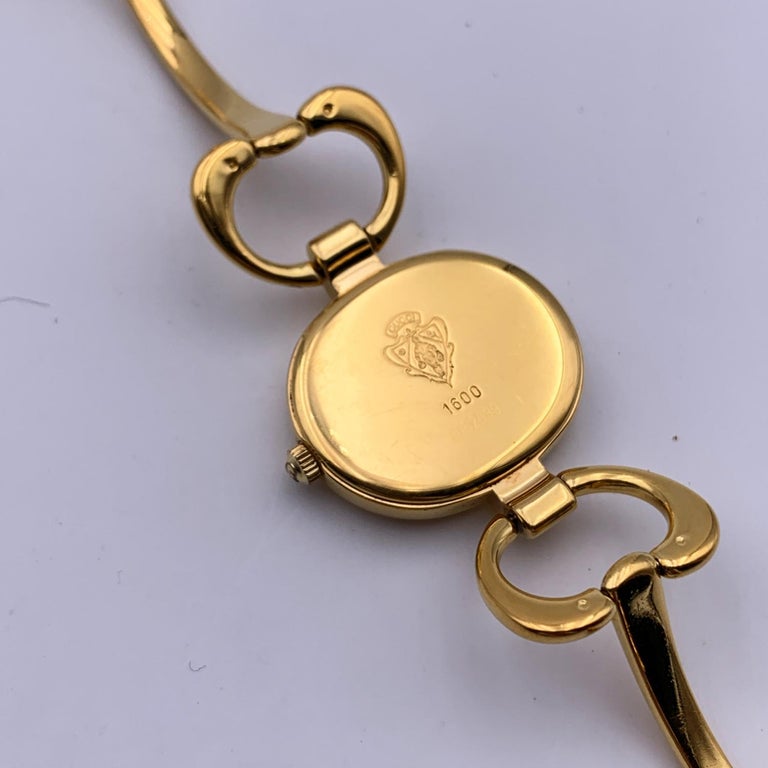 Gucci Vintage Gold Stainless Steel Mod 1600 Bangle Wrist Watch For Sale ...
