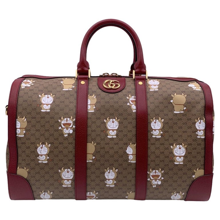 Gucci x Doraemon Mini GG Supreme Canvas Duffle Holdall Bag For Sale at ...