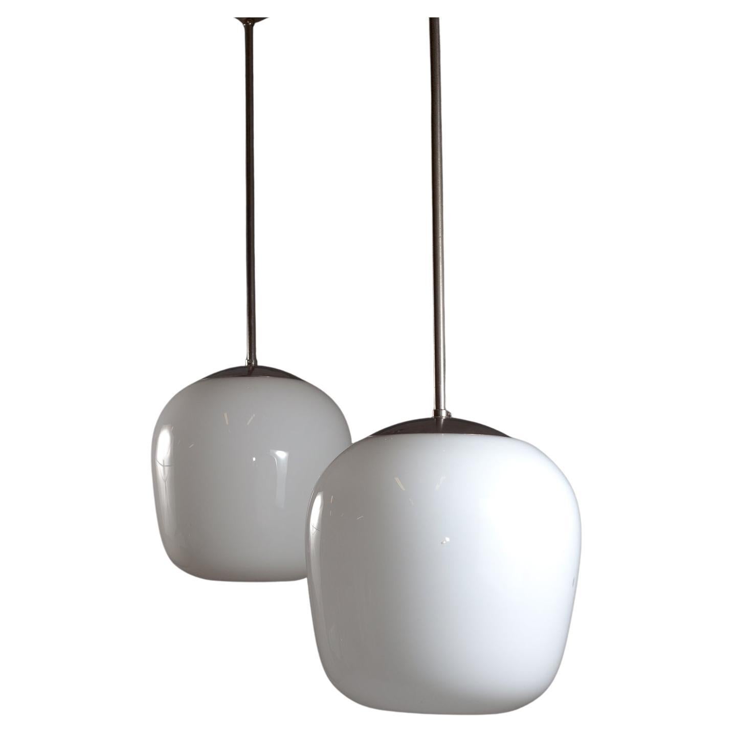 Gunnel Nyman, pair of 1940's opaline glass pendant lamps for Idman Oy ...