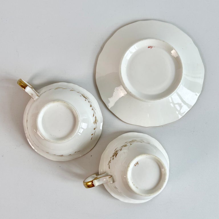 H and R Daniel Porcelain Teacup Trio, Peach and Gilt Shells, Regency ca ...