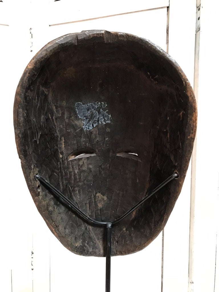 Hand Carved African Wooden Mask on Stand For Sale at 1stDibs