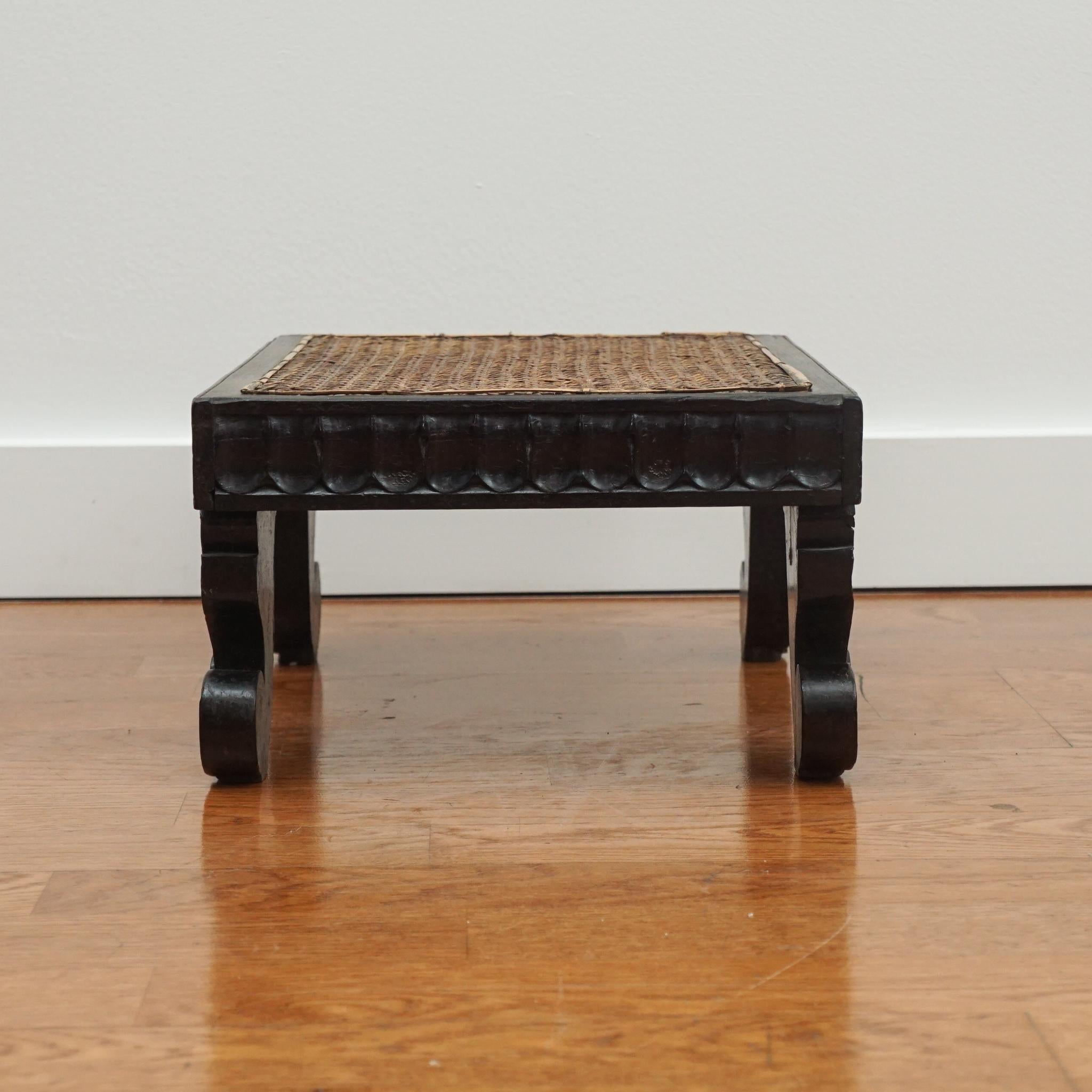 Hand-Carved Ebony Caned Foot Stool For Sale at 1stDibs