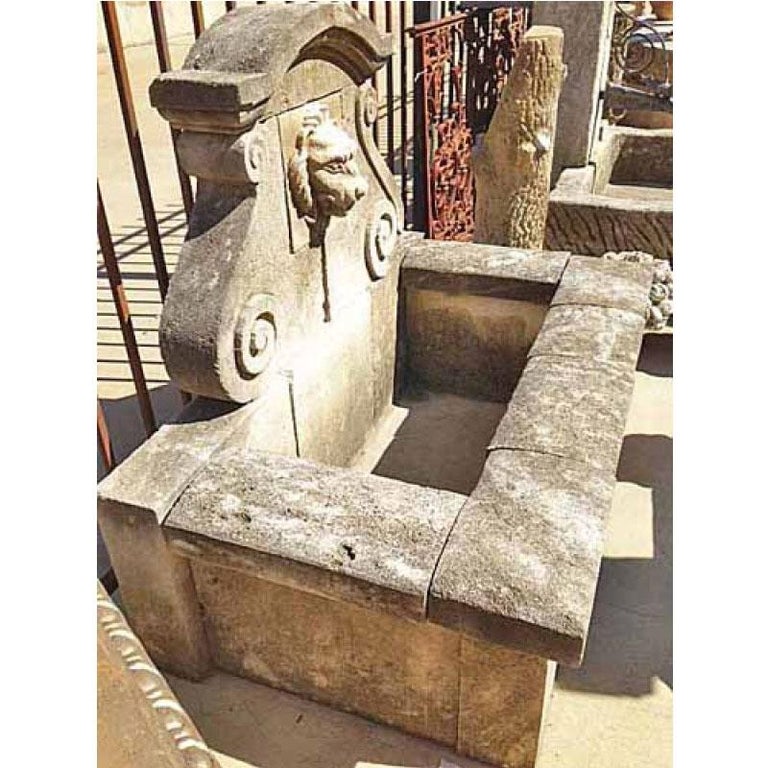 Hand Carved Limestone Wall Fountain For Sale at 1stDibs