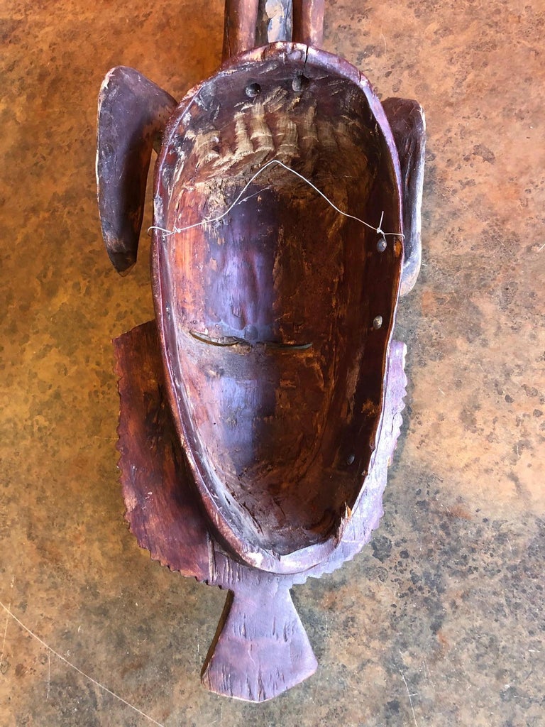 Hand Carved Primitive Tribal Mask For Sale at 1stDibs