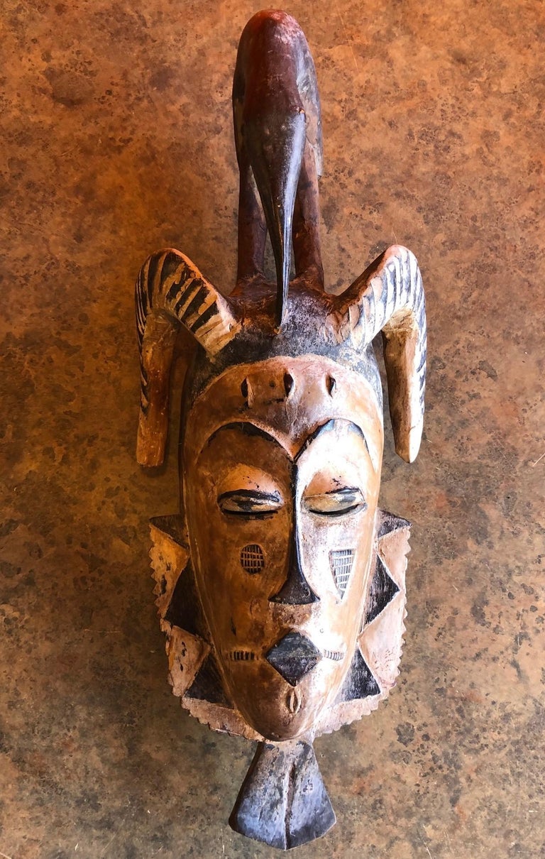 Hand Carved Primitive Tribal Mask For Sale at 1stDibs