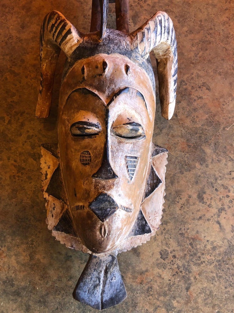 Hand Carved Primitive Tribal Mask For Sale at 1stDibs