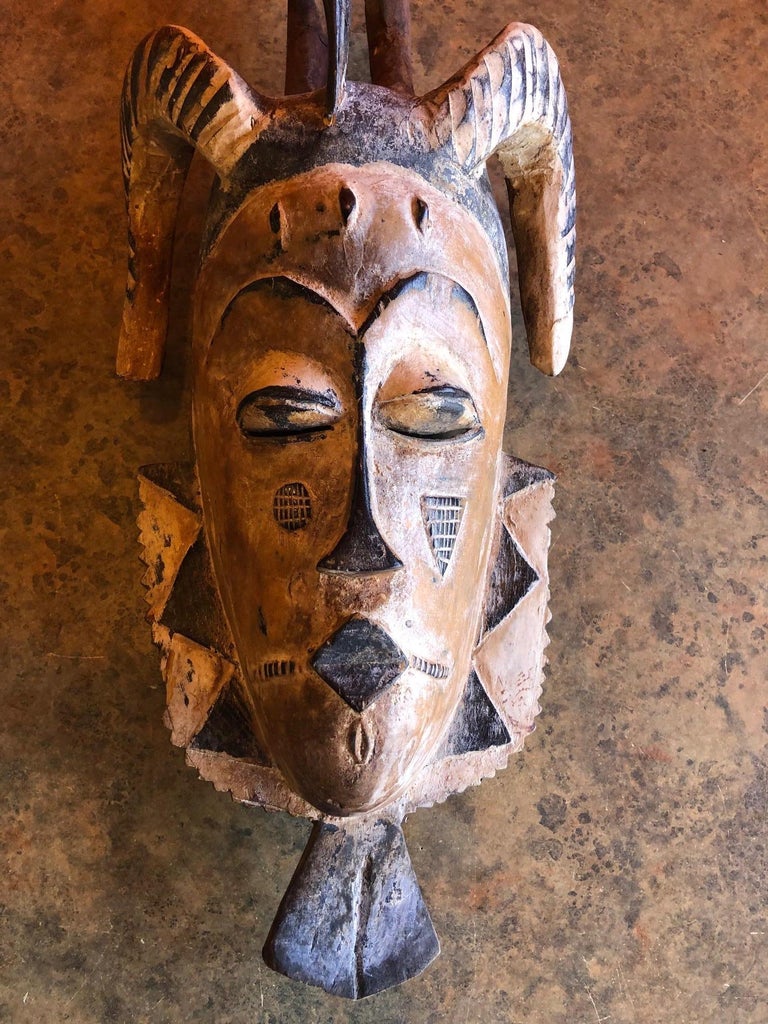 Hand Carved Primitive Tribal Mask For Sale at 1stDibs