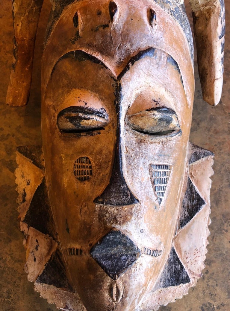Hand Carved Primitive Tribal Mask For Sale at 1stDibs