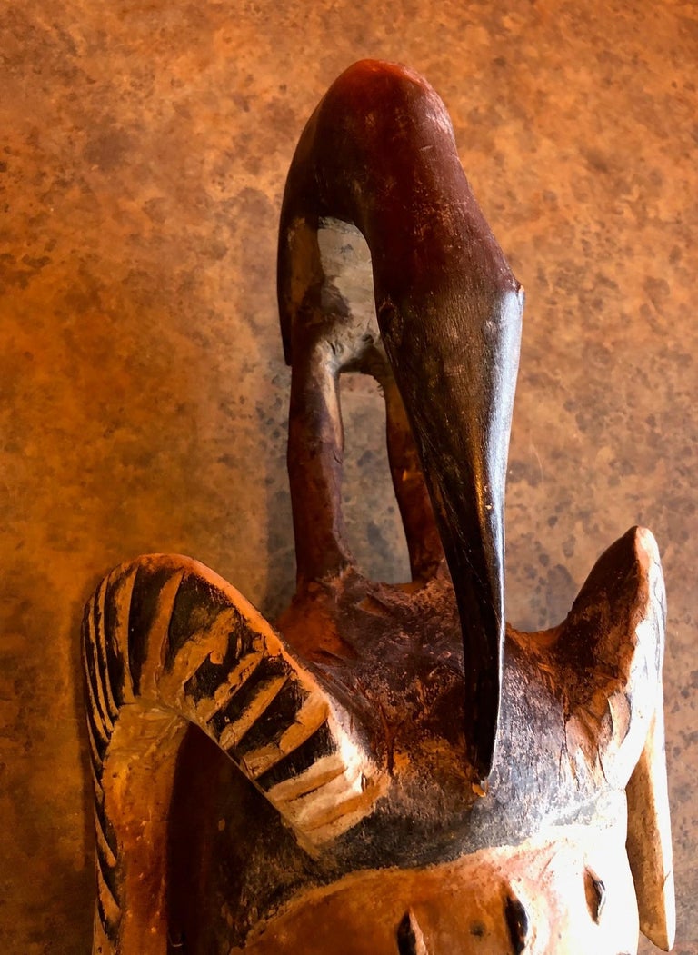Hand Carved Primitive Tribal Mask For Sale at 1stDibs