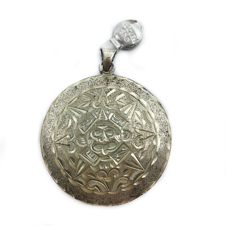 Hand Carved Silver Desert Worker Round Necklace Pendant For Sale at 1stDibs