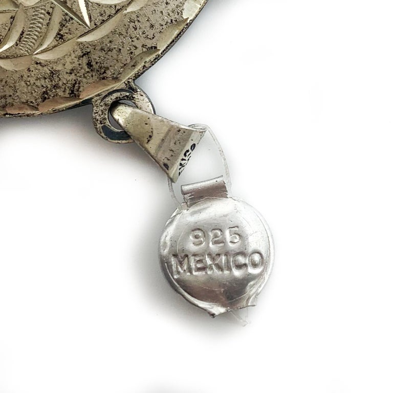 Hand Carved Silver Desert Worker Round Necklace Pendant For Sale at 1stDibs