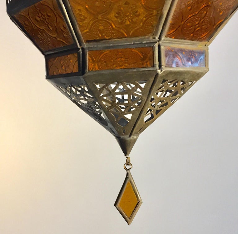 Moroccan Metal and Amber Glass Lantern, Octagonal Diamond Shape at 1stDibs