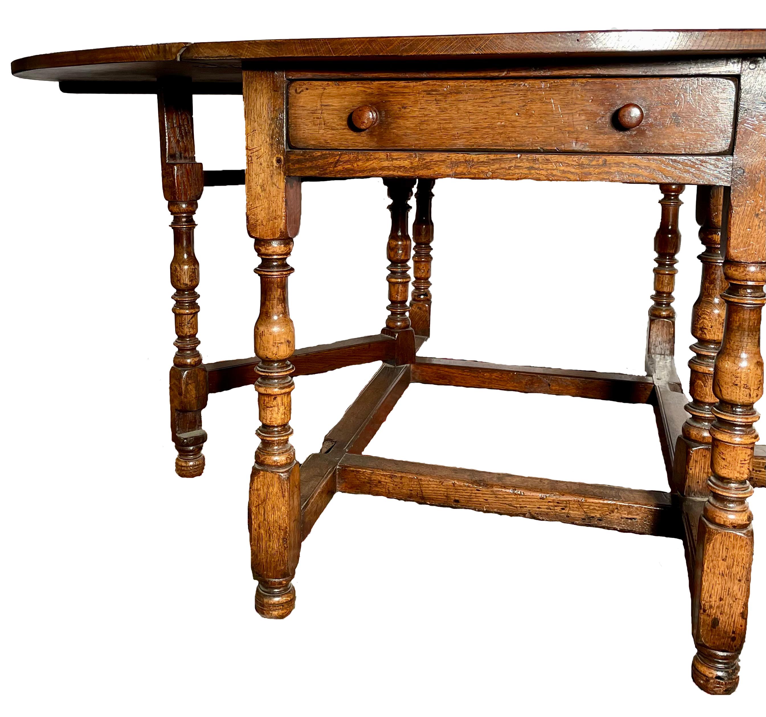 Handmade English Solid Oak Drop-Leaf Dining Table. For Sale at 1stDibs