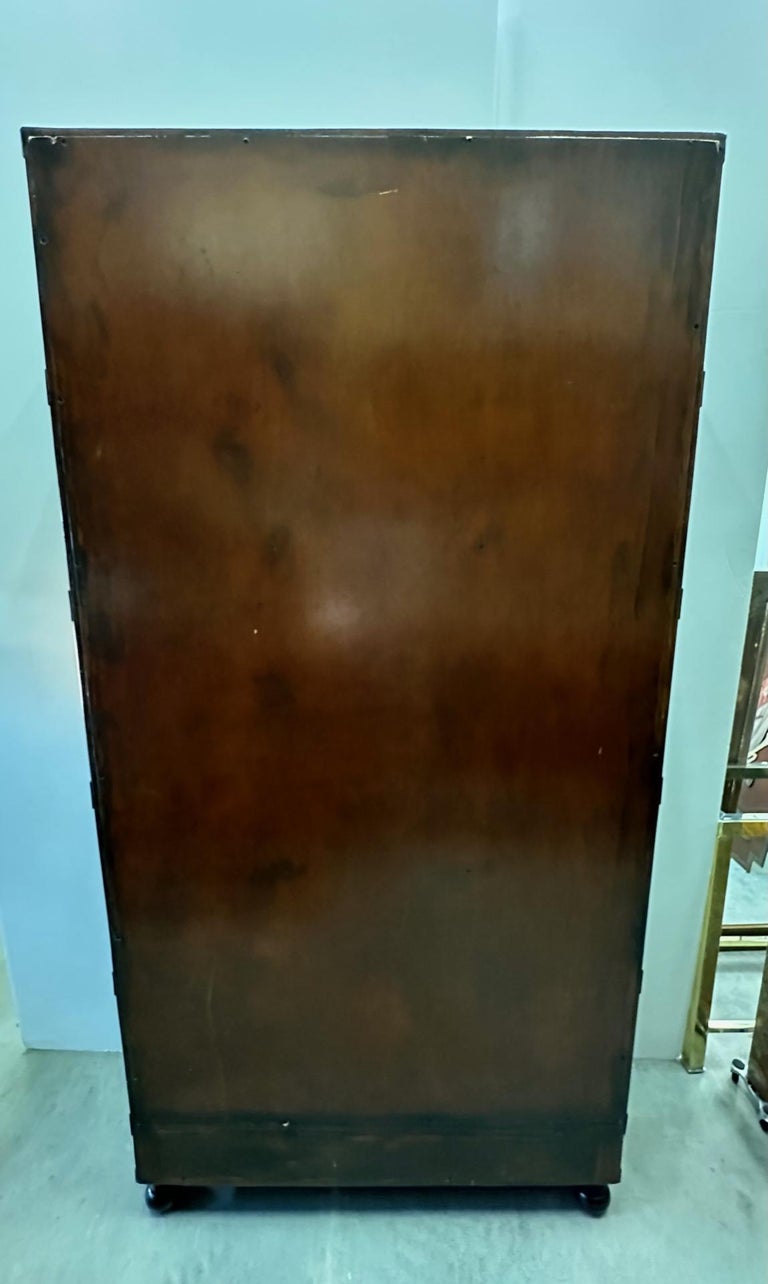 Handsome Campaign Style Leather Wrapped Bookcase For Sale at 1stDibs