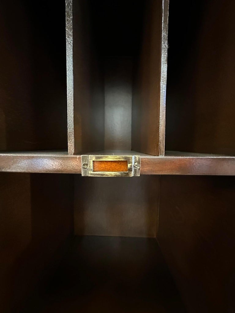 Handsome Campaign Style Leather Wrapped Bookcase For Sale at 1stDibs